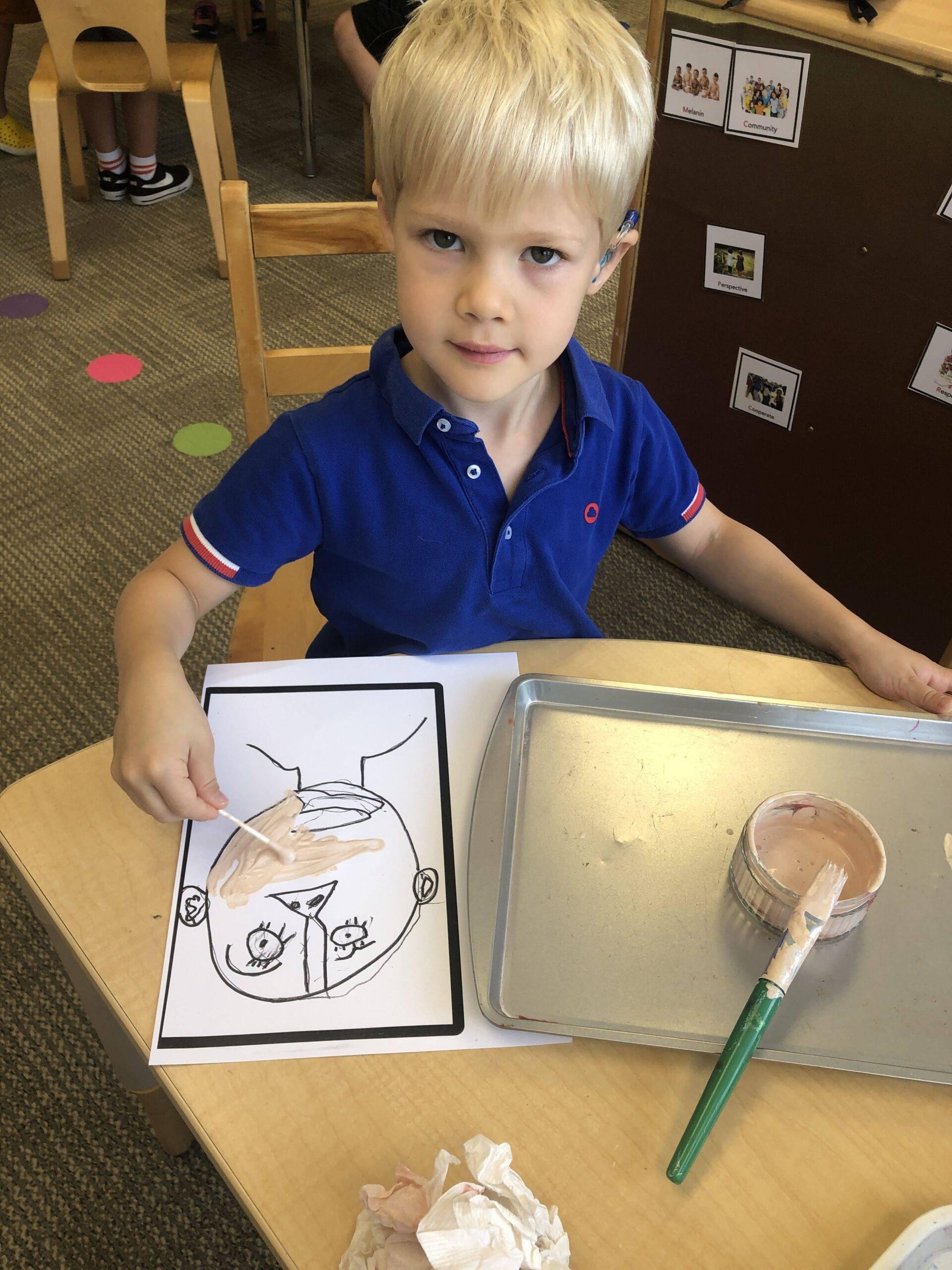 K student working on self portrait - Private School in Washington DC ...